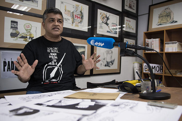Malaysian cartoonist Zunar investigated over criticism of state ...