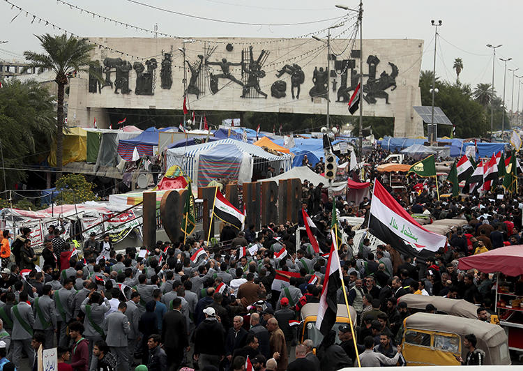 One journalist killed, another missing amid protests in Iraq ...